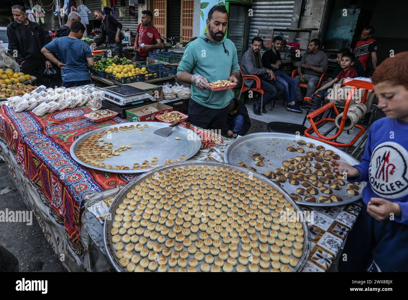 Rafah, Palestinian Territories. 28th Mar, 2024. Palestinians sell ...