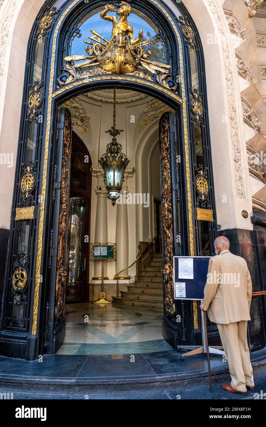 A Well Dressed Man Enters The Centro Naval (Sede Central) Social Club ...