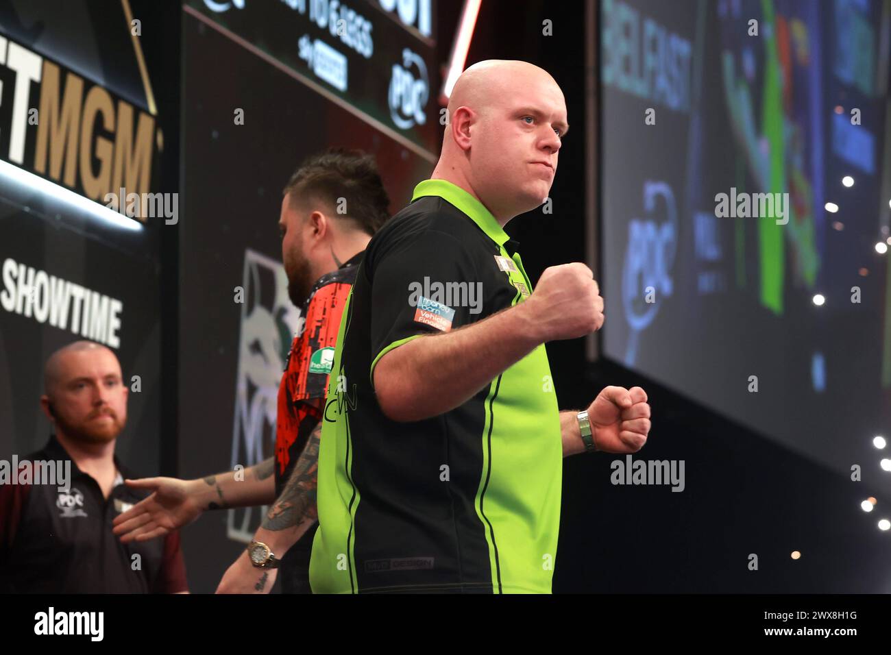 Michael van Gerwen celebrates victory in the quarter-final against ...