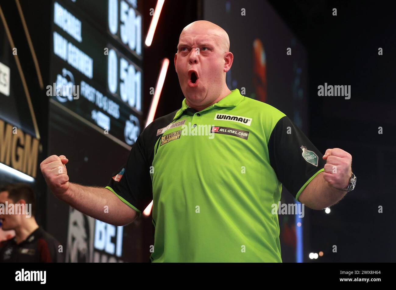 Michael van Gerwen celebrates victory in the quarter-final against ...