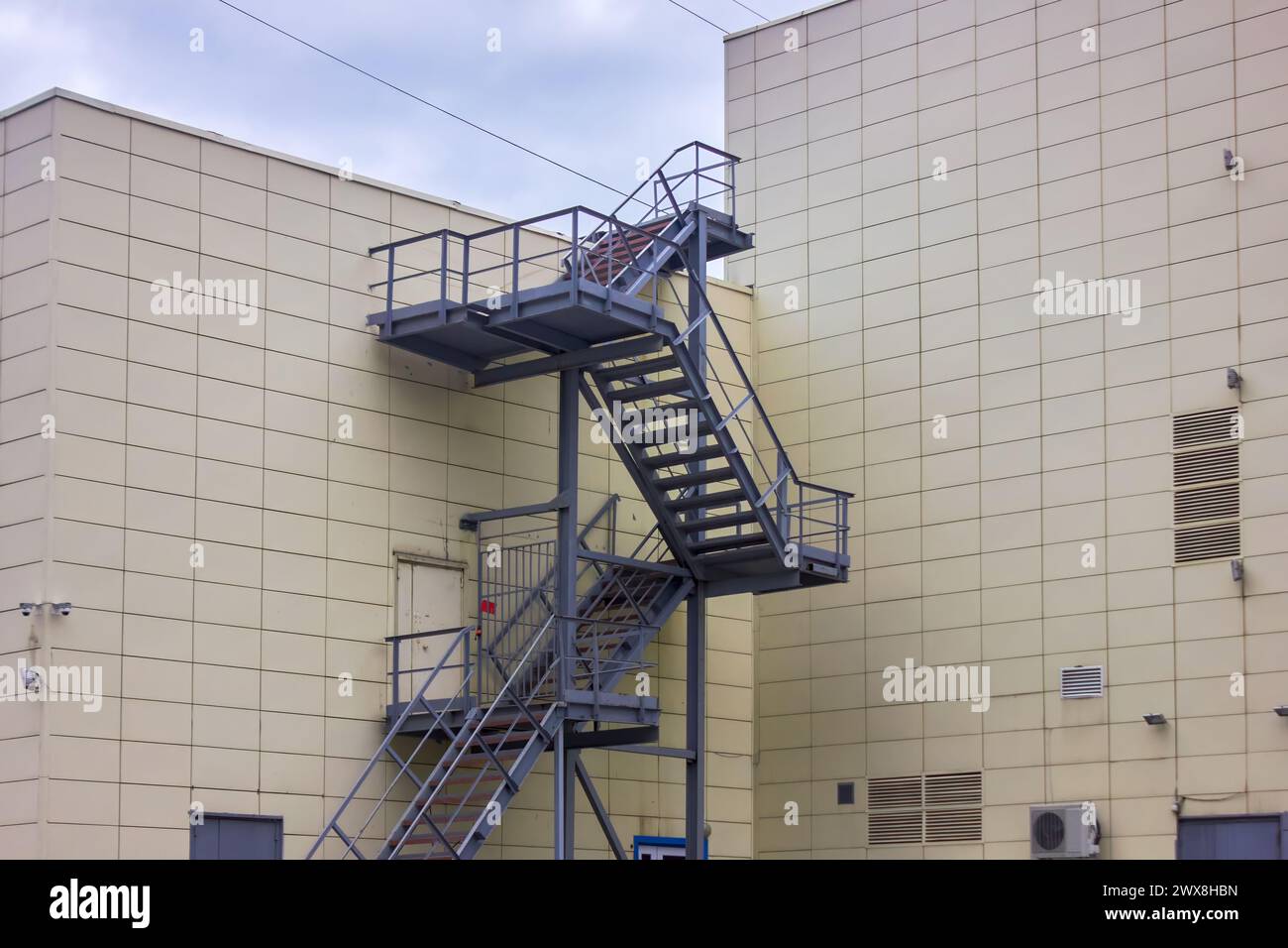 Fire escape stair steel. Outdoor metal fire escape in a shopping center ...