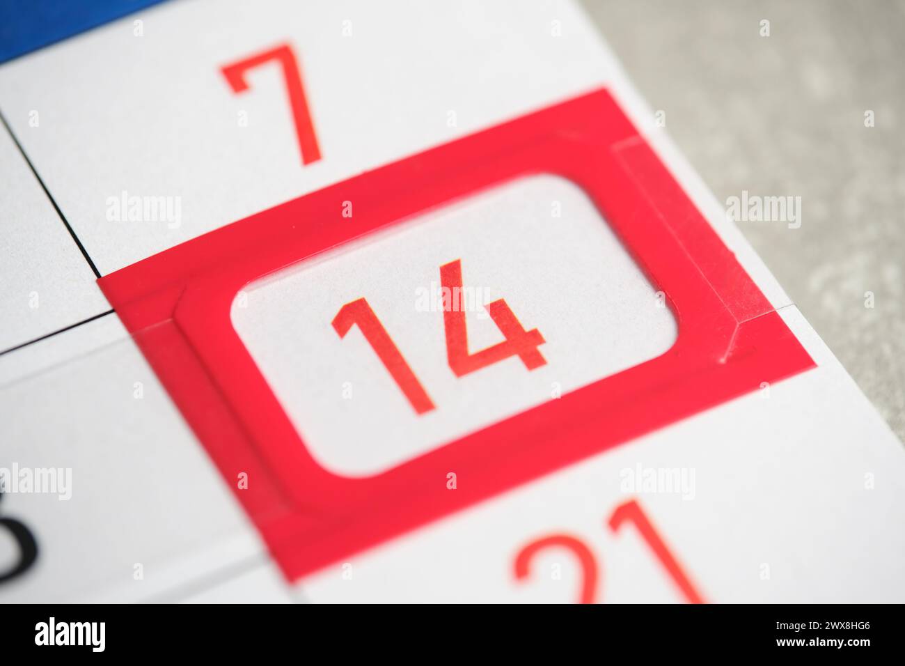Calendar date. The 14th number the calendar is highlighted in a red ...
