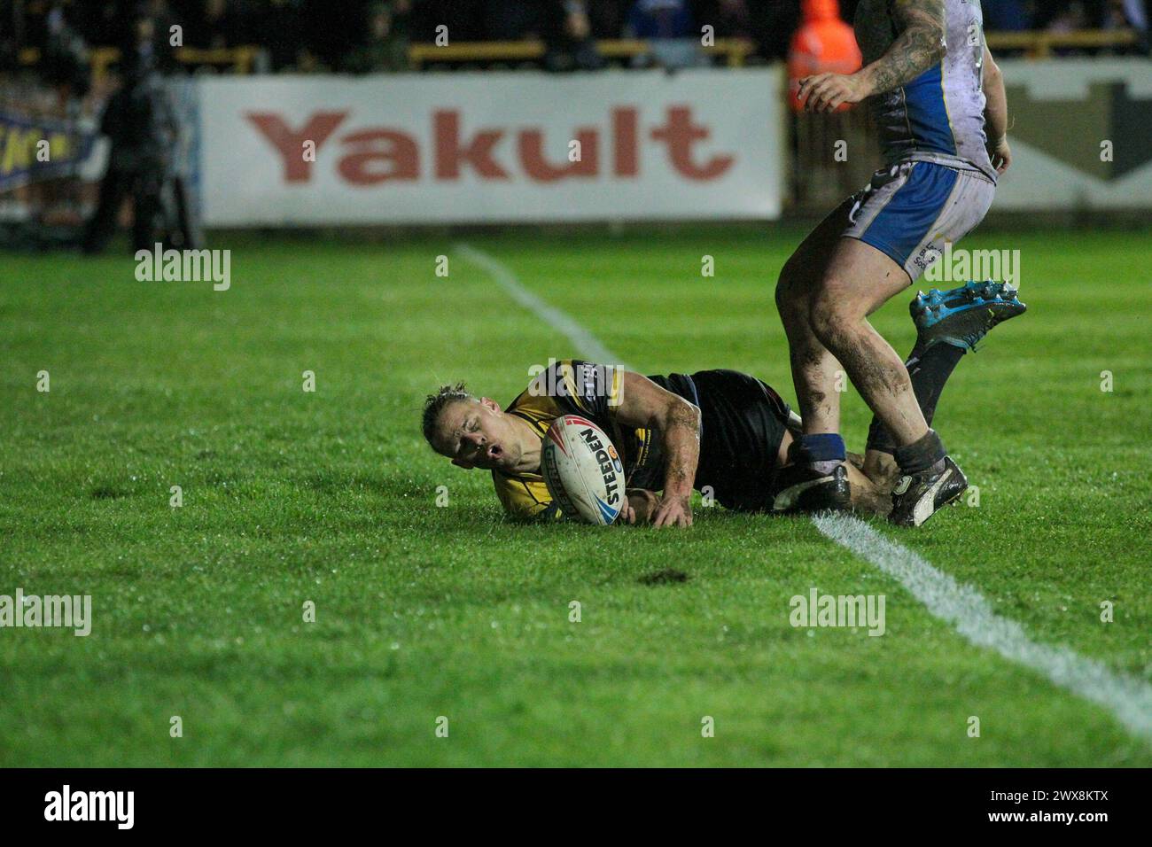 Castleford, UK. 28th Mar, 2024. Jacob Miller can't stop he ball from ...