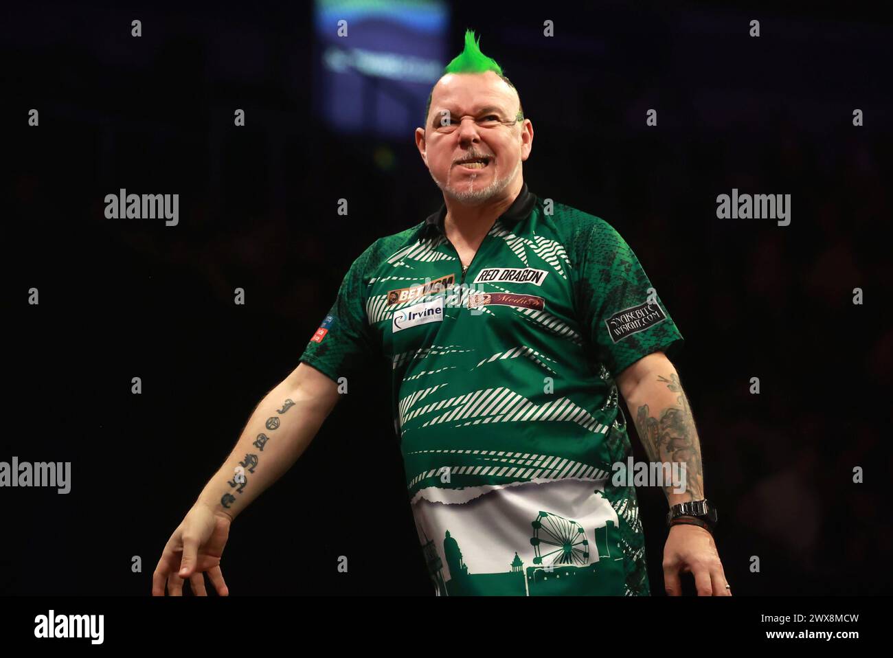 Peter Wright reacts in the quarter-final match against Rob Cross during ...