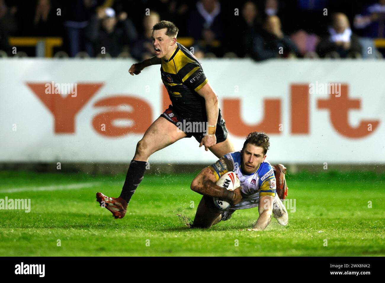 Leeds Rhinos' Paul Momirovski scores his side's second try of the game ...