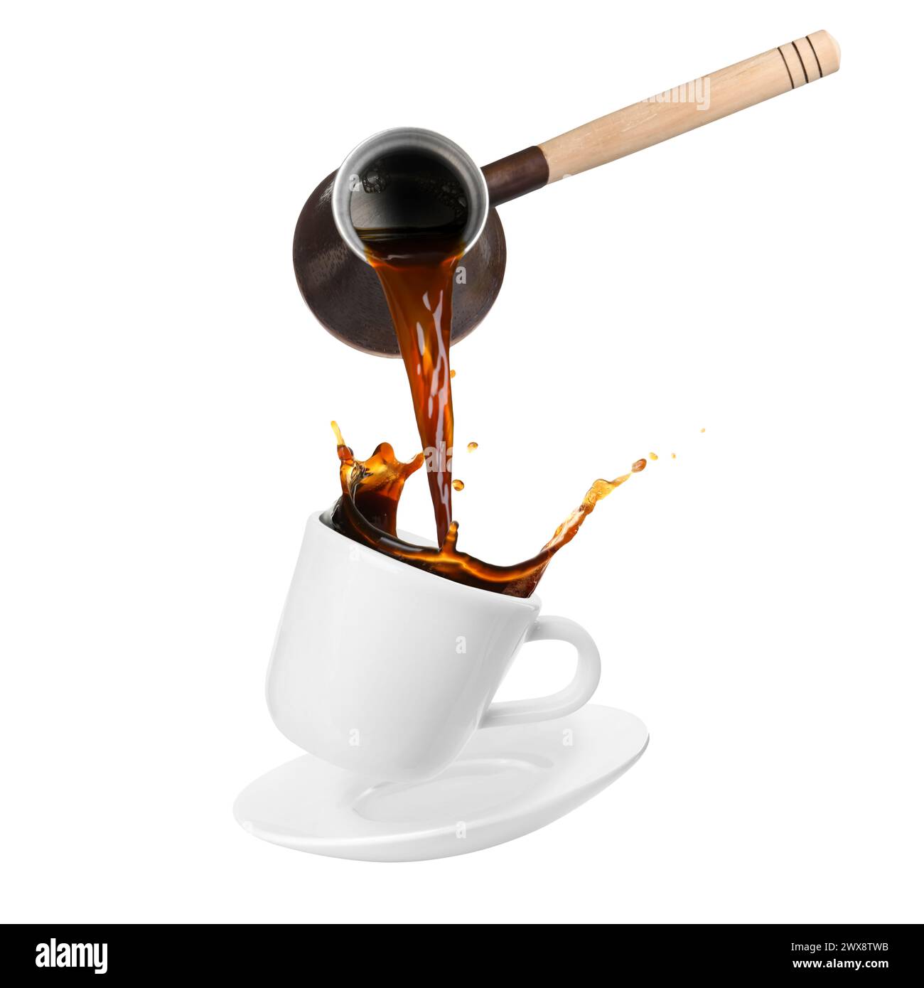 Pouring freshly brewed aromatic coffee from turkish pot into cup ...