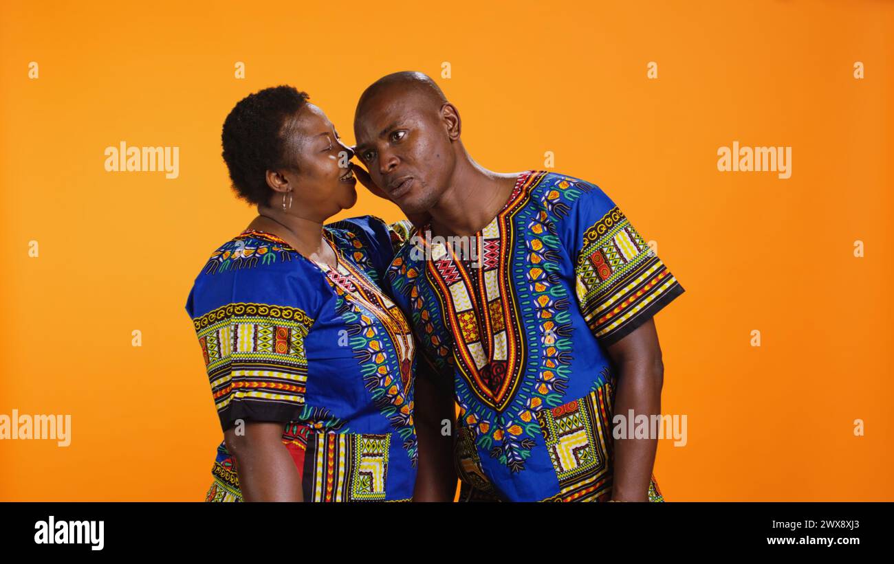 African american woman sharing a secret information, whispering ...