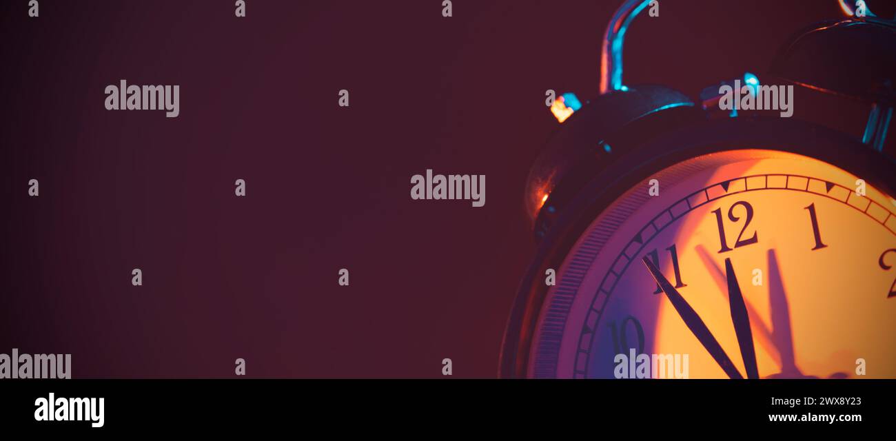 Five minutes to midnight on retro analog clock. Time change Stock Photo ...