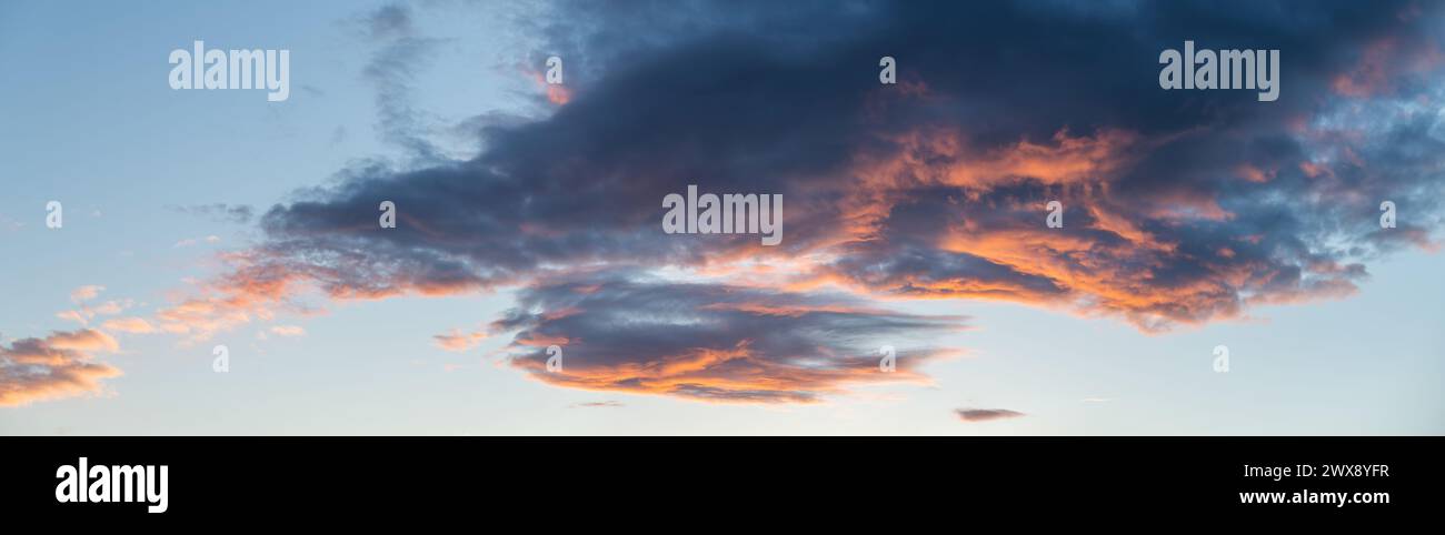 Captivating clouds at sunset, painted with vibrant hues, perfect for ...