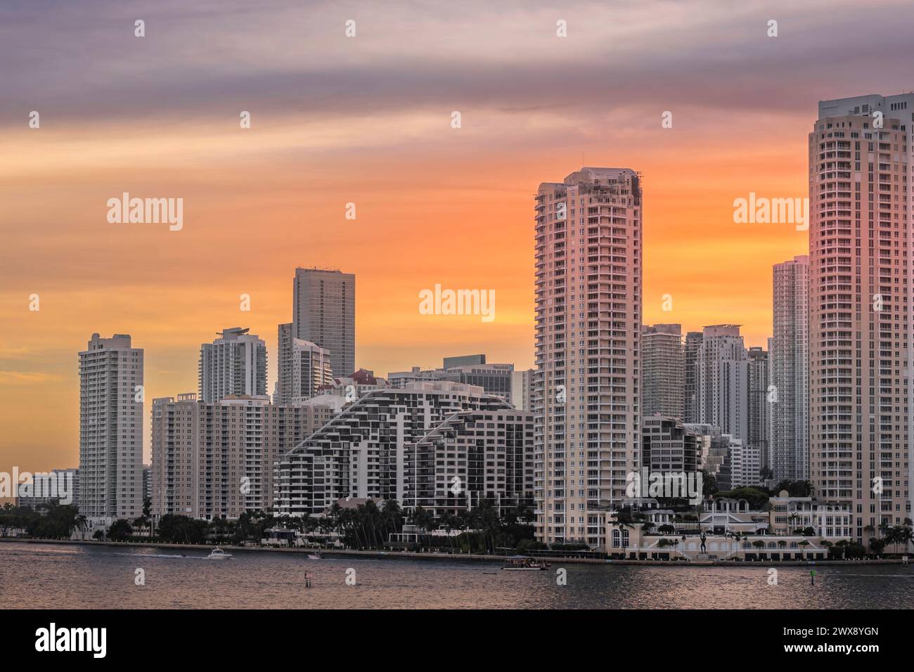 Miami, Florida, USA - July 29, 2023: Orange sky over buildings on ...
