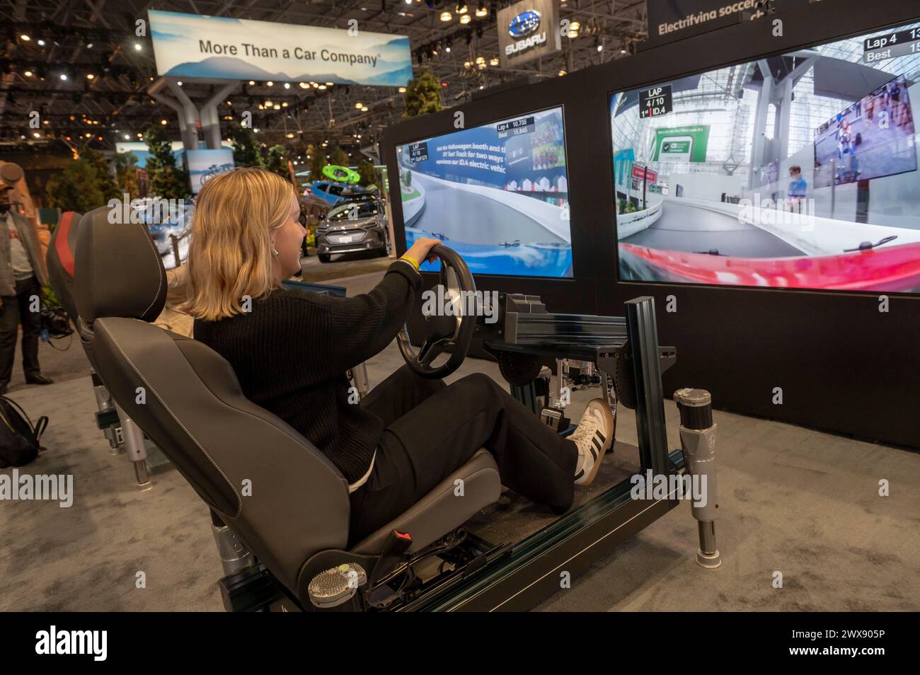 New York, United States. 27th Mar, 2024. Women use the Volkswagen ID.4 ...