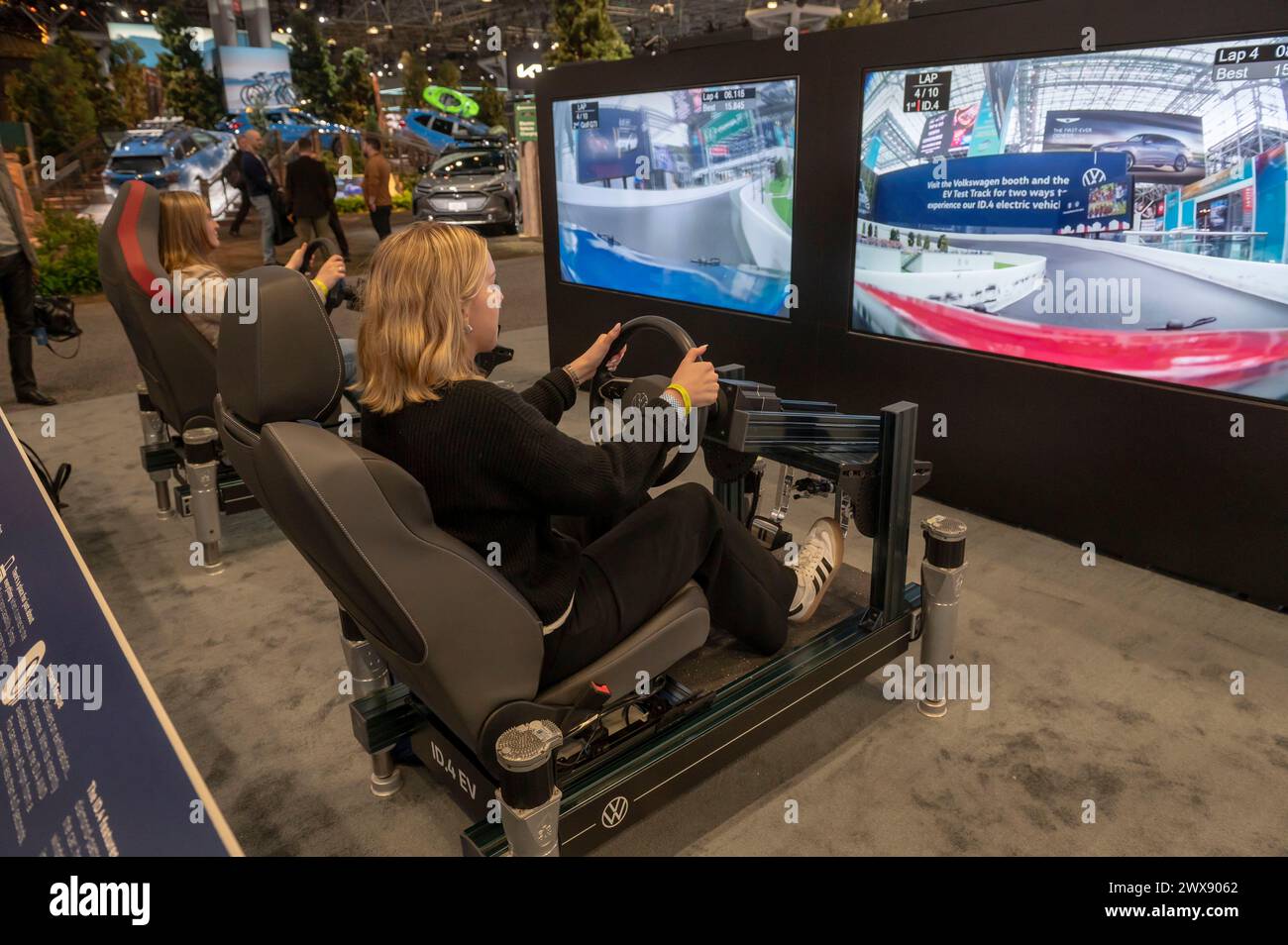 New York, United States. 27th Mar, 2024. Women use the Volkswagen ID.4 ...