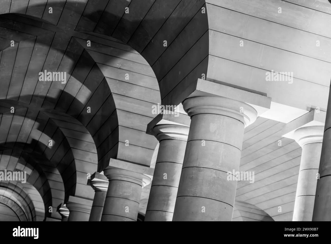 Striking repetition of stone arches and columns in the crypt of the ...