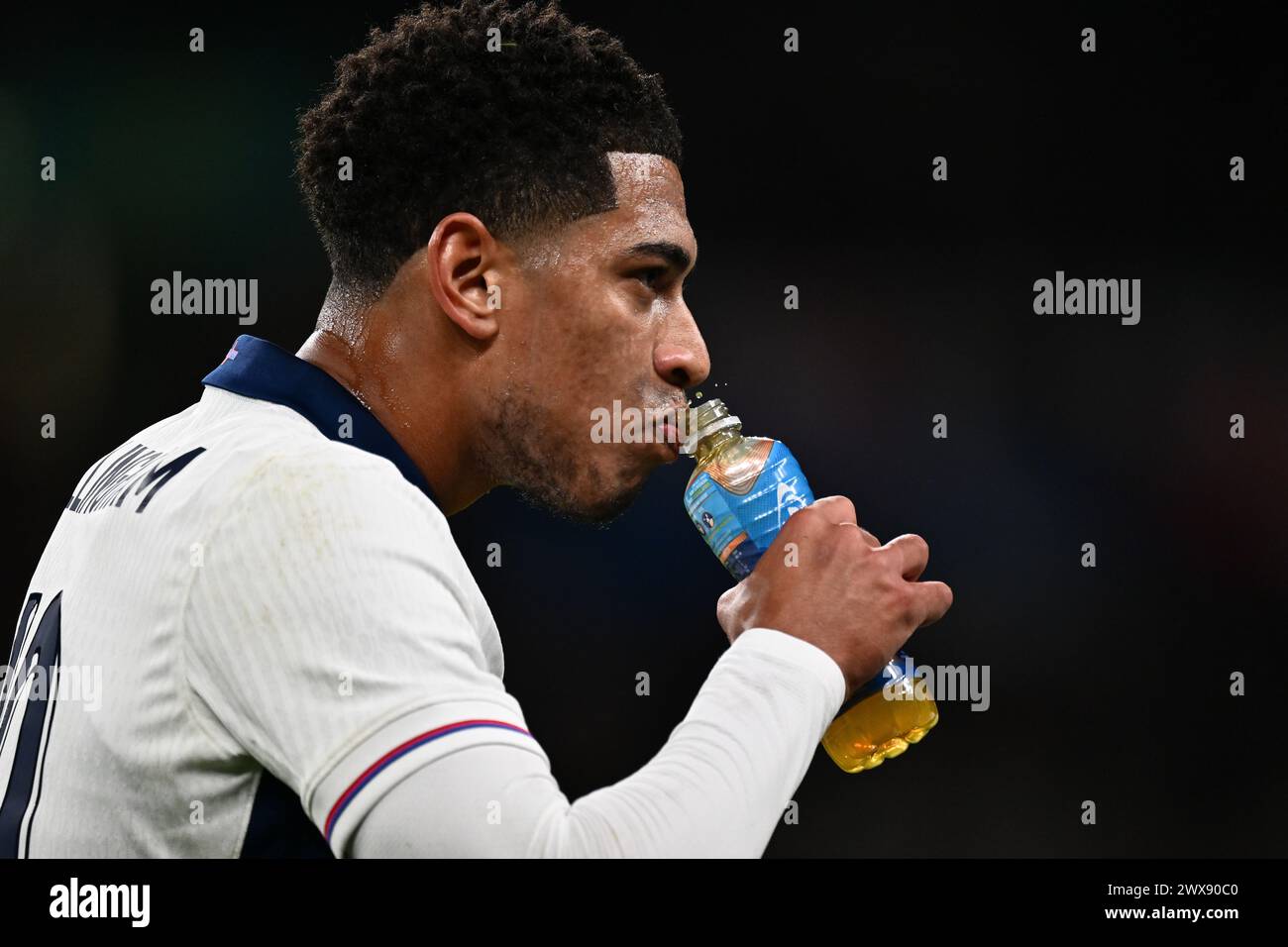 LONDON, ENGLAND - MARCH 23: Jude Bellingham of England drinks Lucozade ...