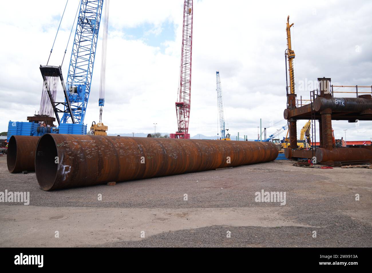 The 85-inch diameter pile from the anchoring ceremony is staged for ...