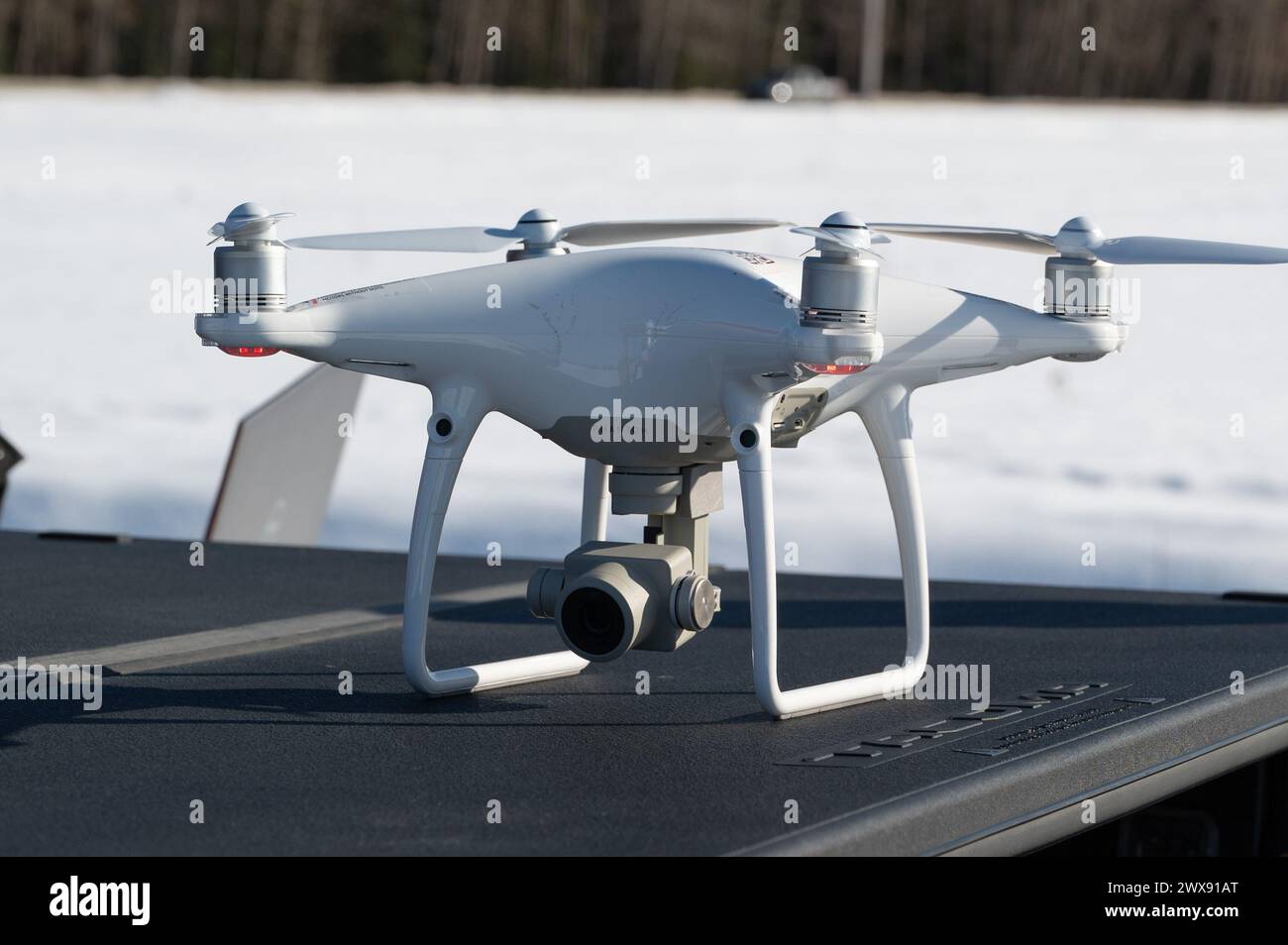 A 354th Security Forces Squadron team launches a drone March 20, 2024 ...
