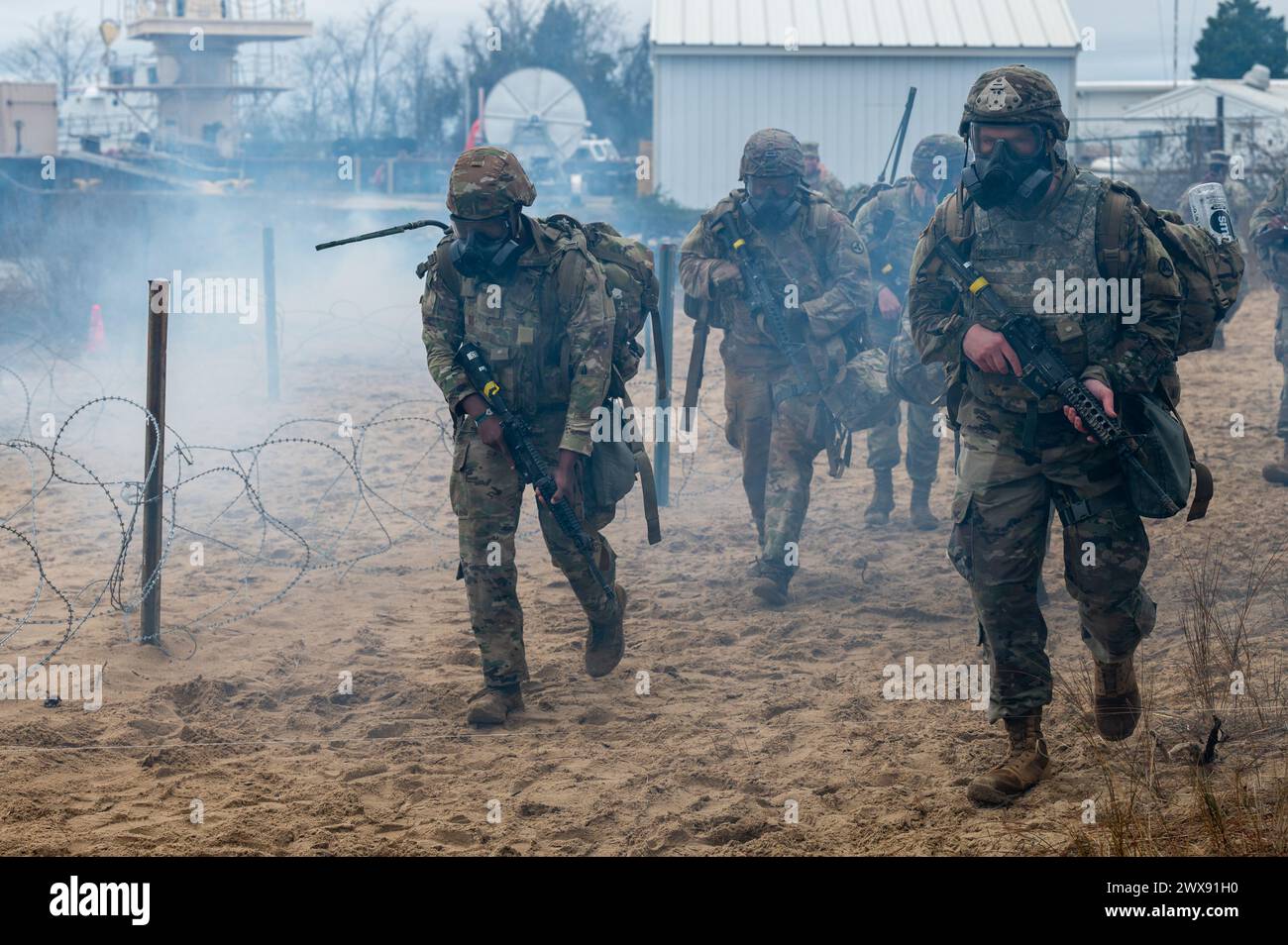 U.S. Soldiers assigned to the 3rd Expeditionary Command ruck to their ...
