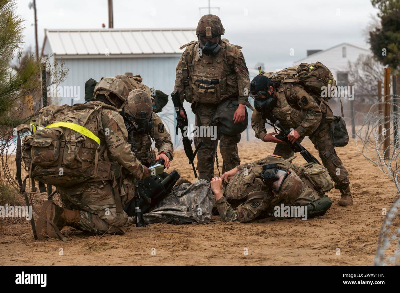 U.S. Soldiers assigned to the 18th Field Artillery Brigade respond to a ...