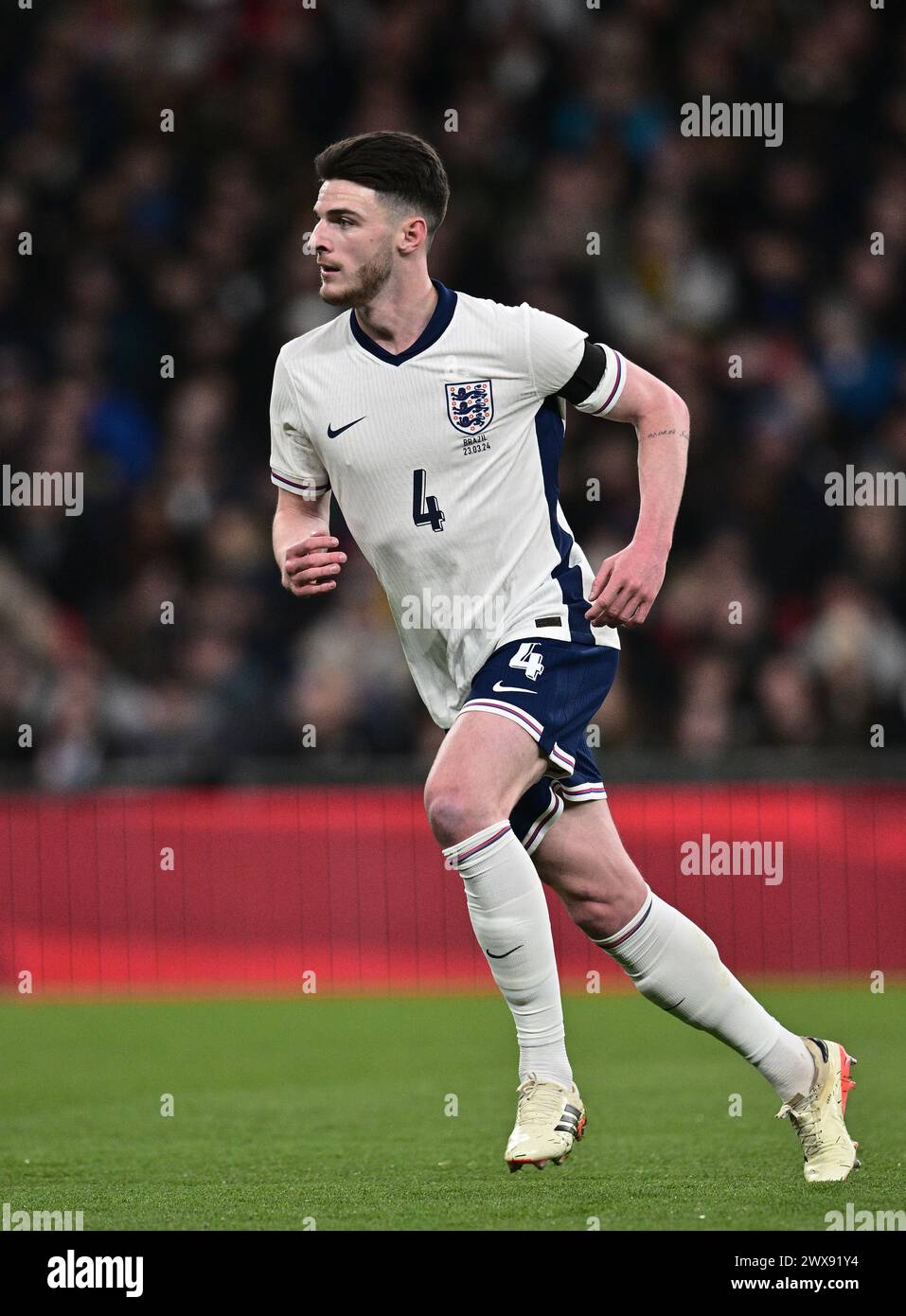 LONDON, ENGLAND - MARCH 23: Decland Rice of England in home kit, full ...