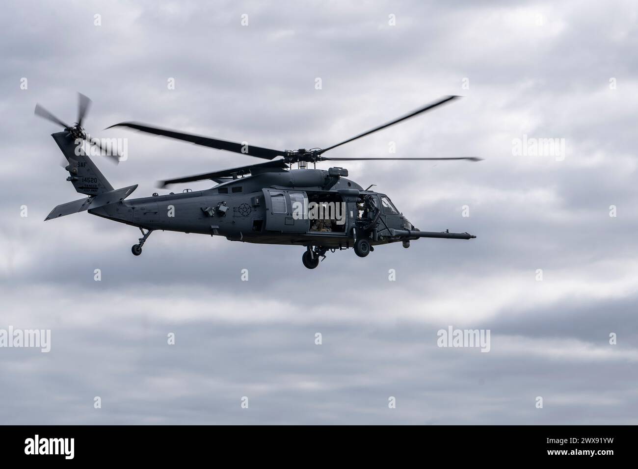 U.S. Air Force Airmen assigned to the 41st Rescue Squadron fly an HH ...