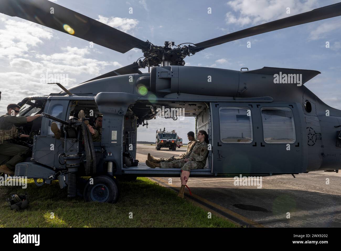 U.S. Air Force Airmen assigned to the 23rd Wing await assistance during ...