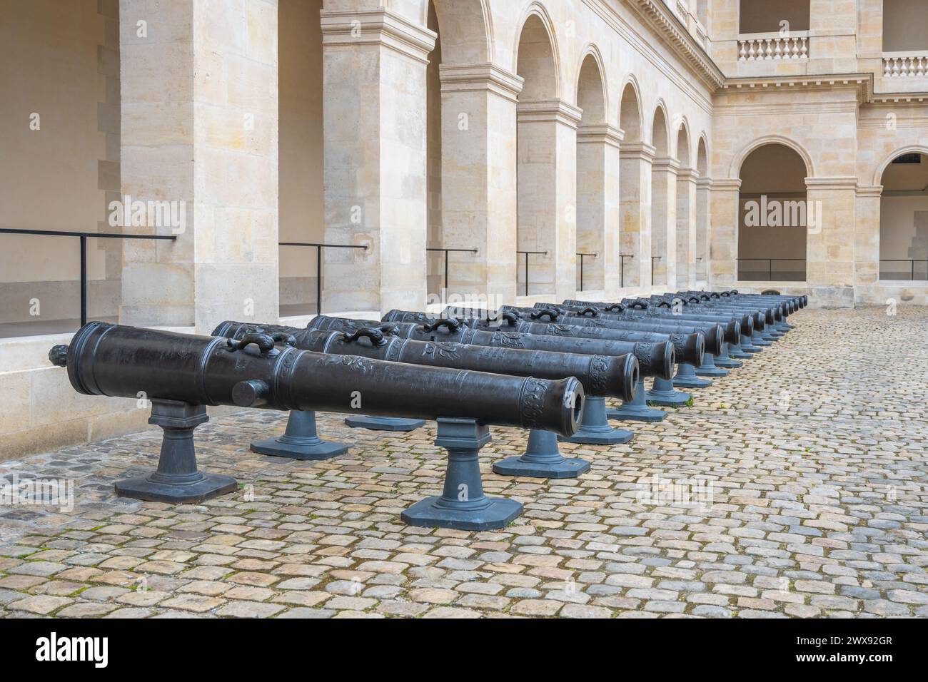 Row of old cannons on display at the historical Les Invalides in Paris ...