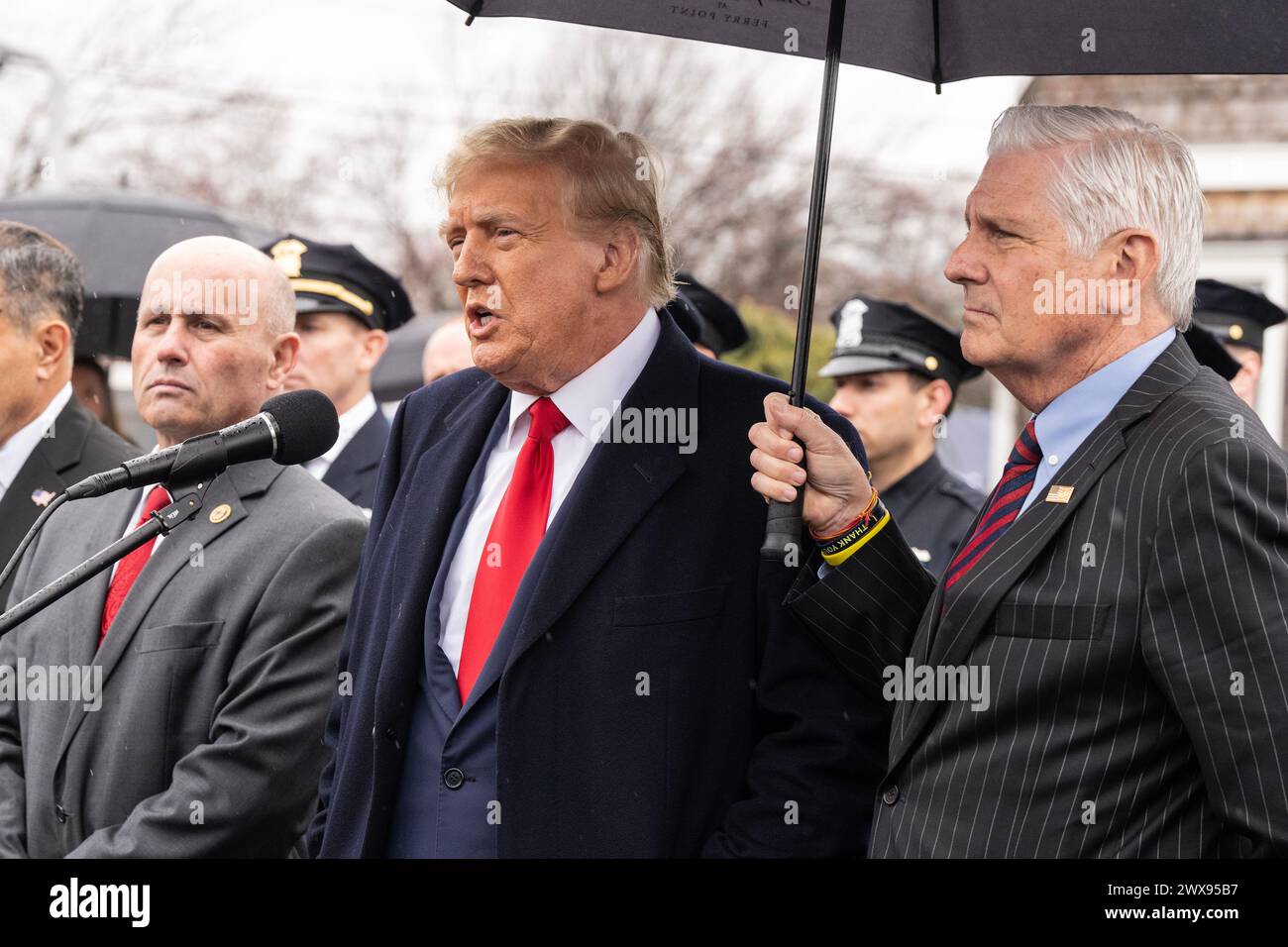 Former President Donald Trump Jr. speaks to the press after attending ...