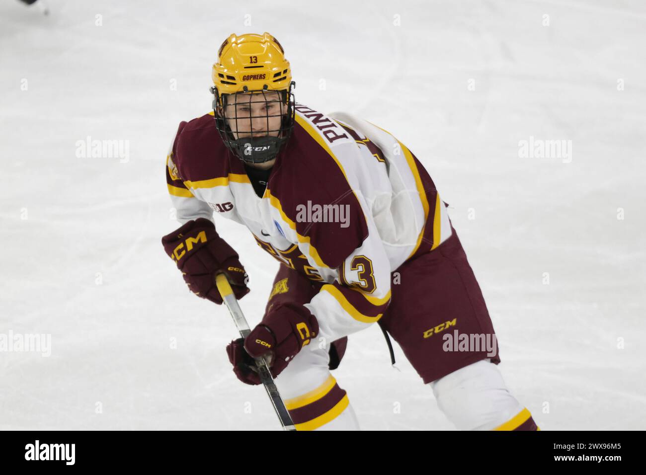 Minnesota forward Garrett Pinoniemi skates against Omaha during an NCAA ...
