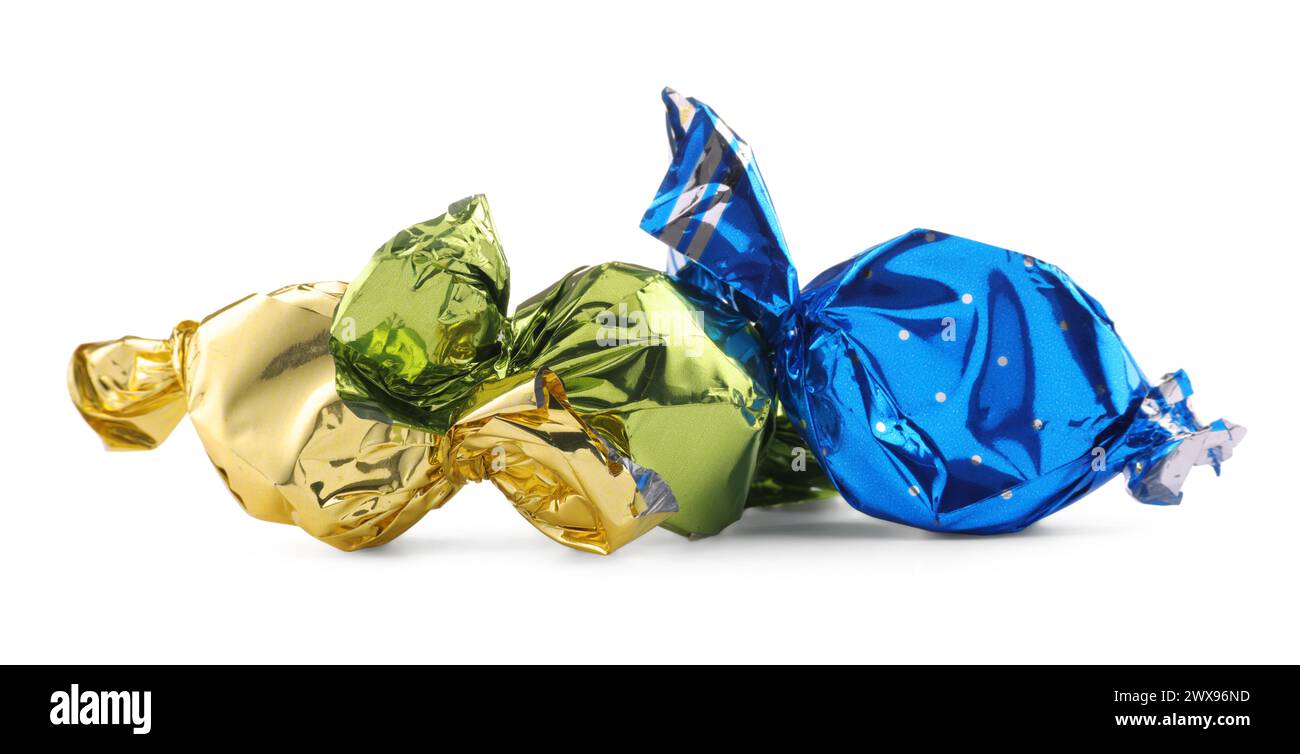 Candies in colorful wrappers isolated on white Stock Photo - Alamy