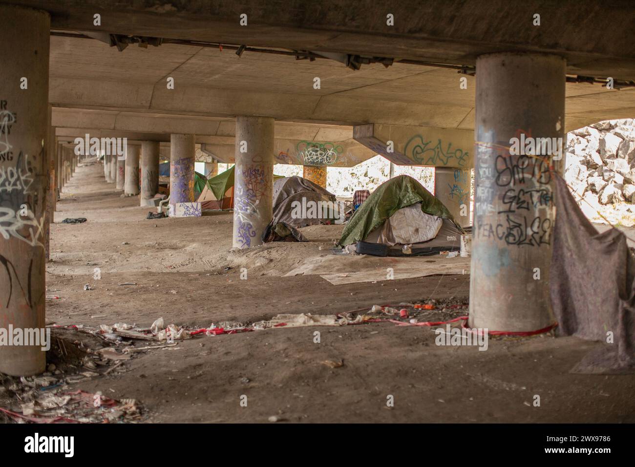 Homelessness Under Bridge Stock Photo - Alamy