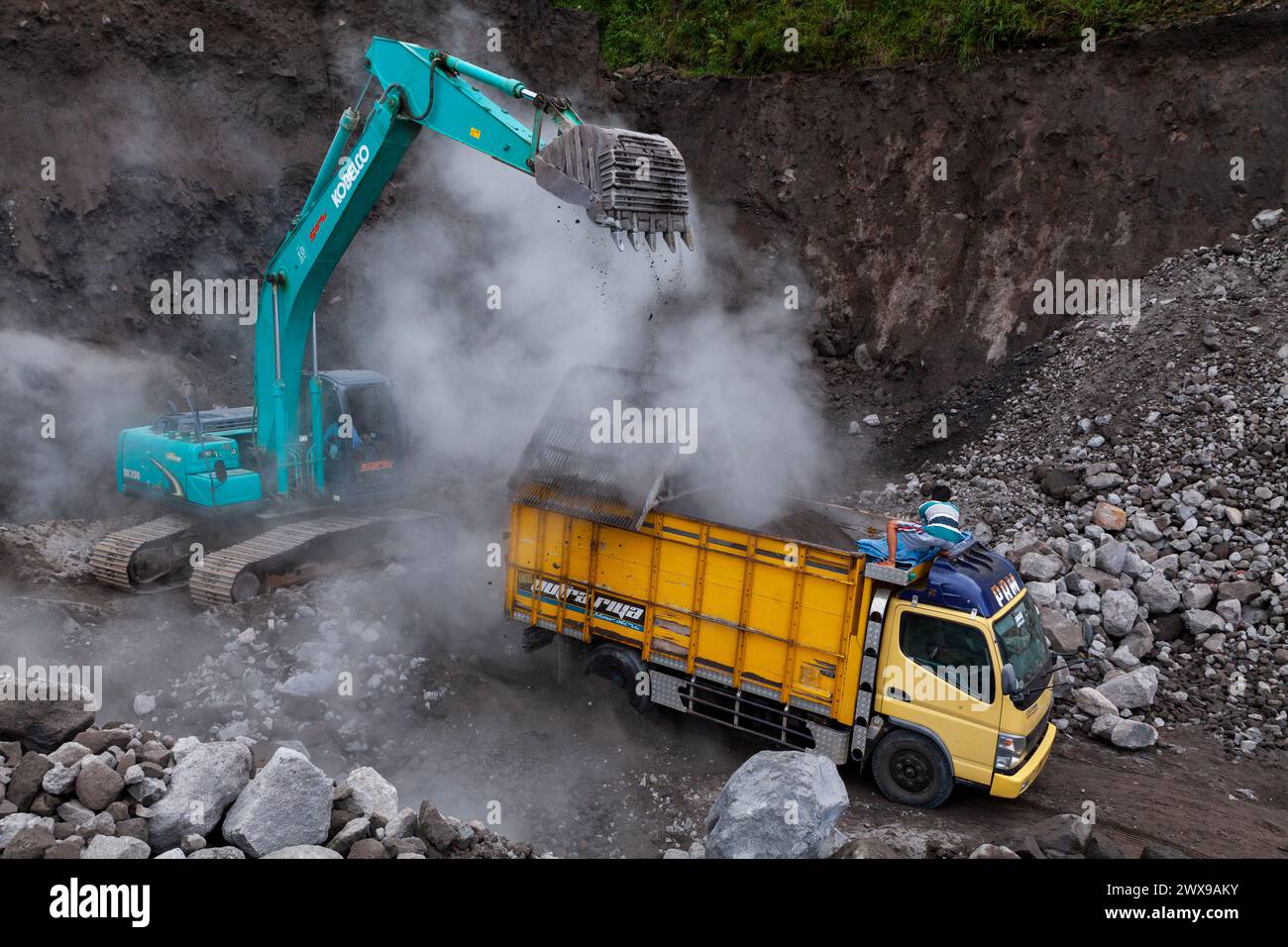 Volcanic sand mining at the bottom of Merapi volcano, Yogjakarta ...