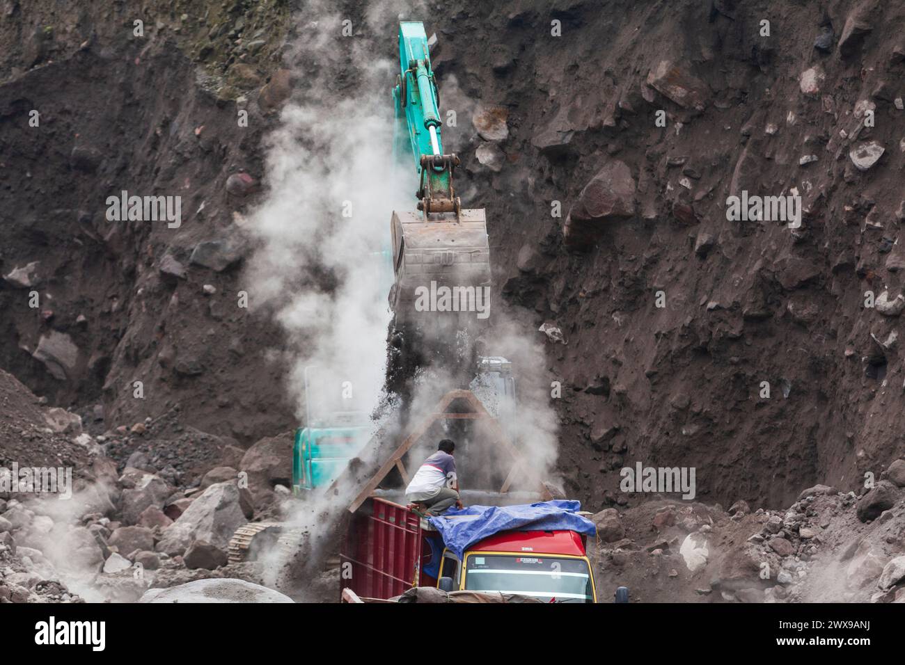 Volcanic sand mining at the bottom of Merapi volcano, Yogjakarta ...