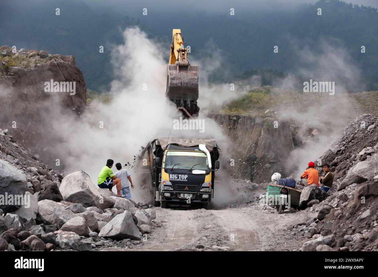 Volcanic sand mining at the bottom of Merapi volcano, Yogjakarta ...