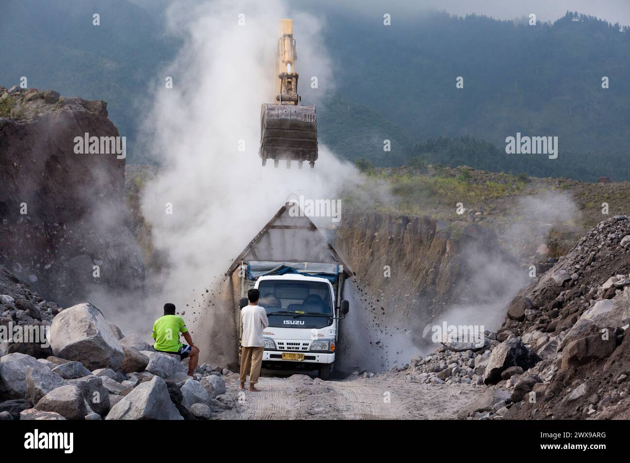 Volcanic sand mining at the bottom of Merapi volcano, Yogjakarta ...