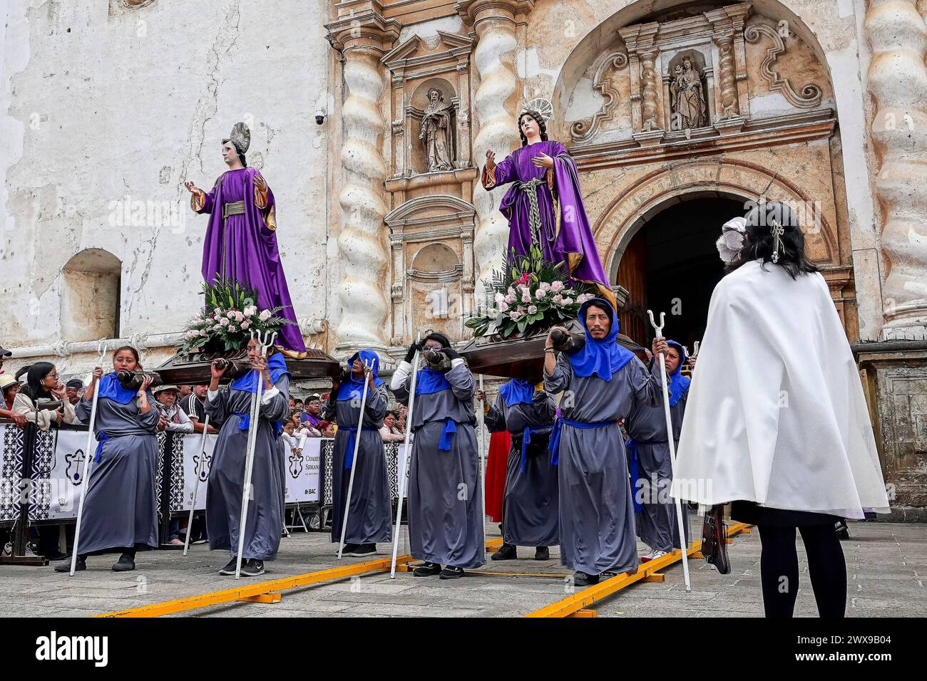 Antigua, Guatemala. 28 March, 2024. Costaleros prepare to carry ...