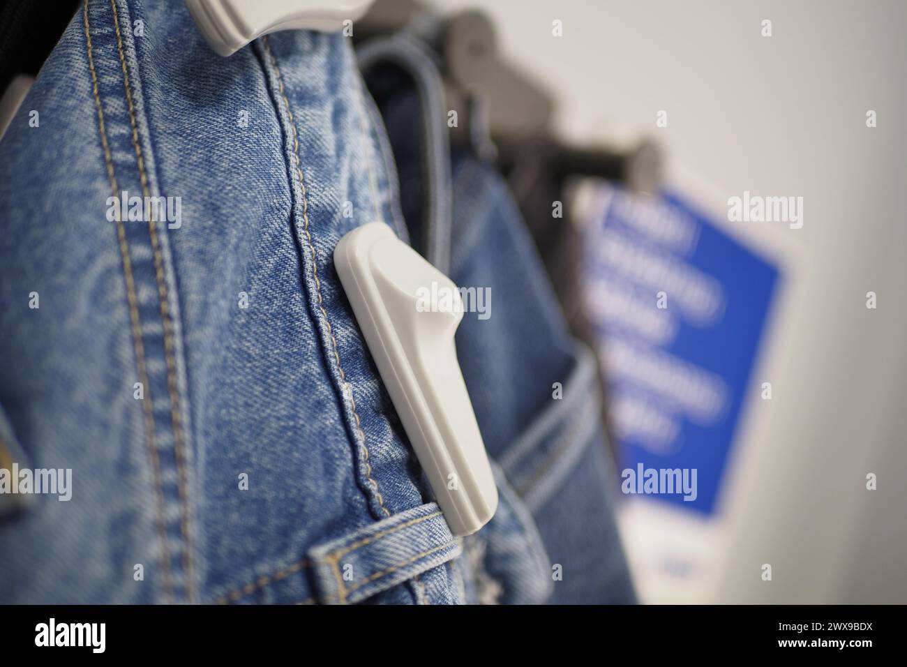 Security tags on clothes hi-res stock photography and images - Alamy