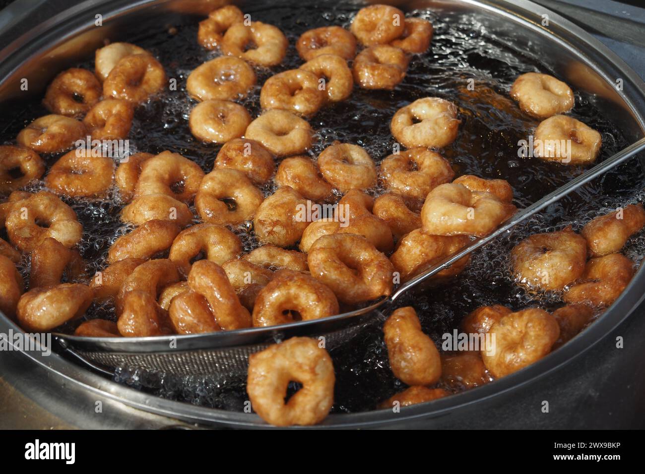 Traditional fried sweets lokma in sugar syrup Stock Photo - Alamy