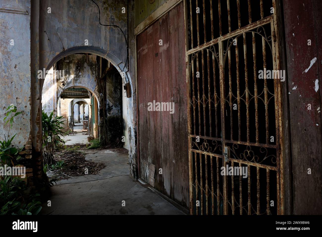 Dilapidated vintage corridor in the abandoned tin mining town of Jalan ...