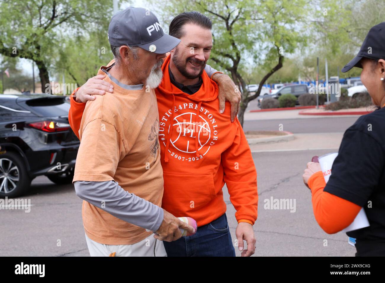 A man greets Nick Lord, the father of Preston Lord before start of the ...