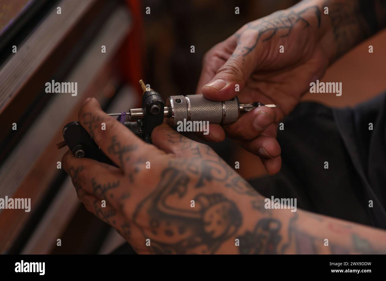 Mexico City, Mexico. 28th Mar, 2024. Tattoo artist, Israel Ortega known ...