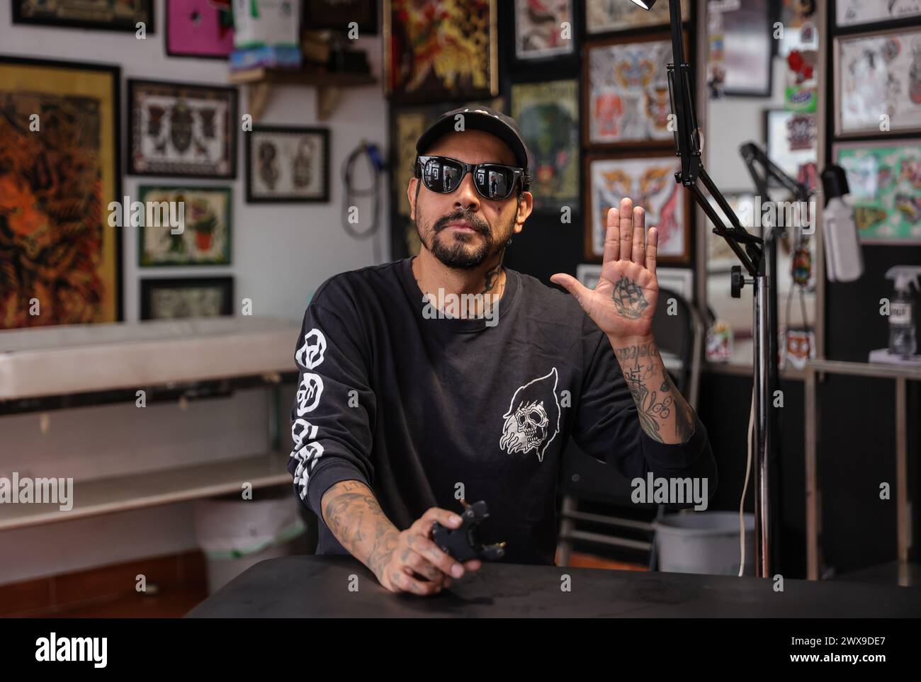 Mexico City, Mexico. 28th Mar, 2024. Tattoo artist, Israel Ortega known ...