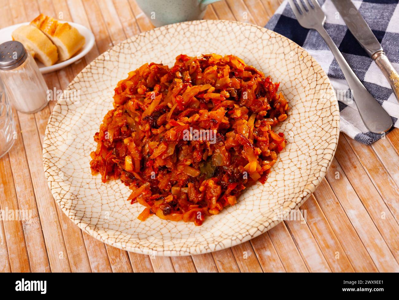 Braised white cabbage with pearl barley, carrot and onion Stock Photo ...