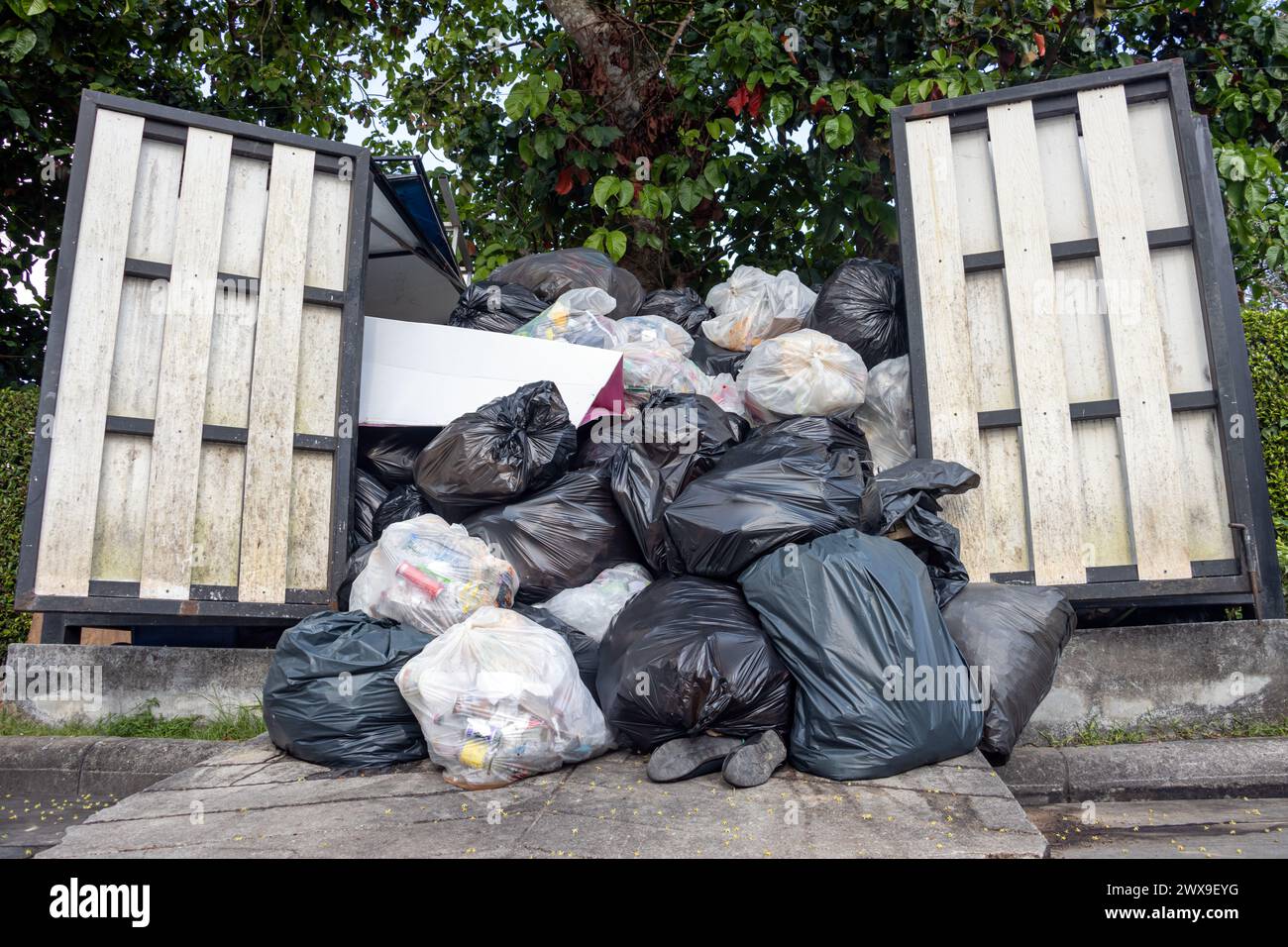 A pile of garbage bags at a collection point Stock Photo - Alamy