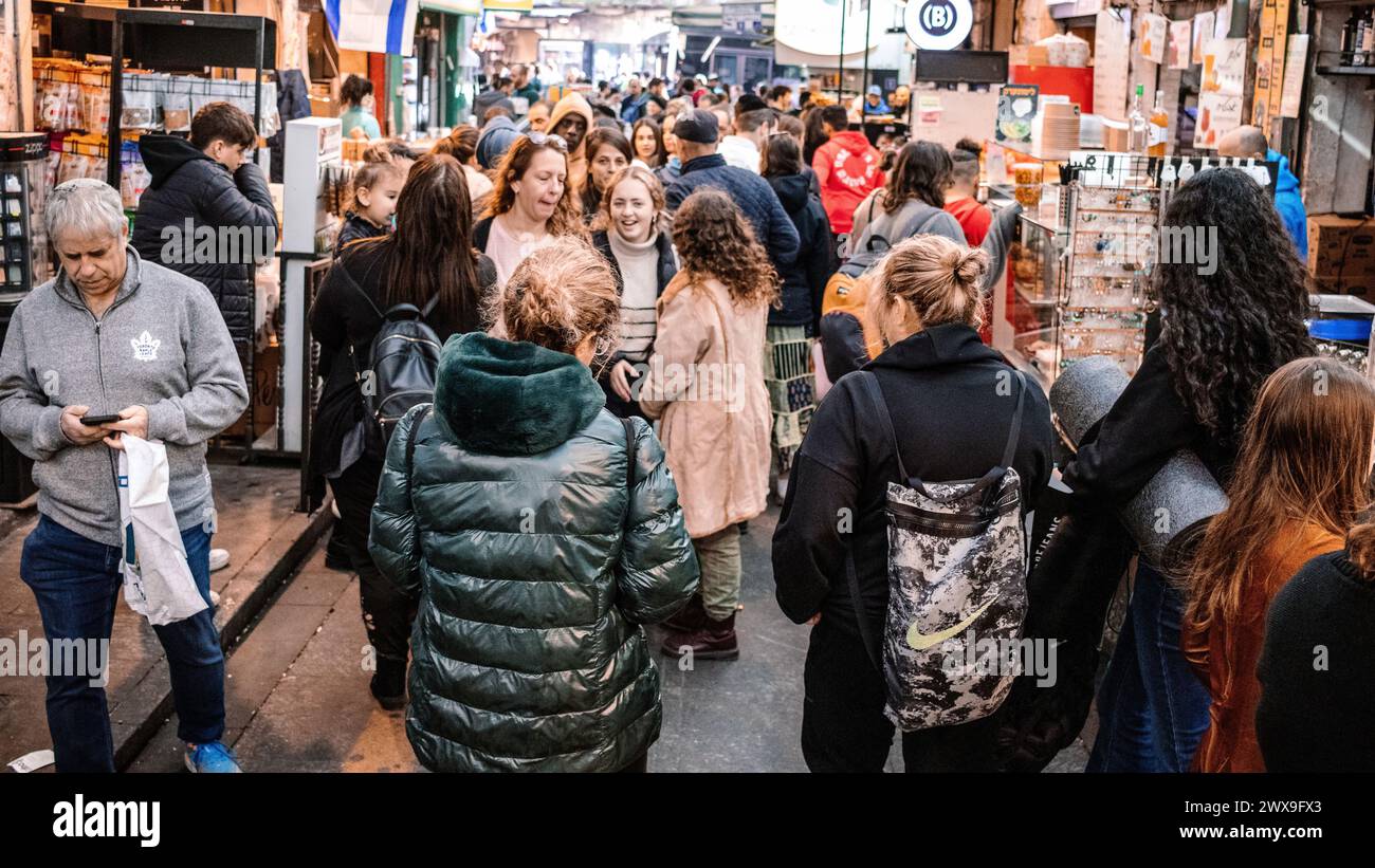 Jerusalem, Israel - December 22, 2023 People shopping at Mahane Yehuda ...