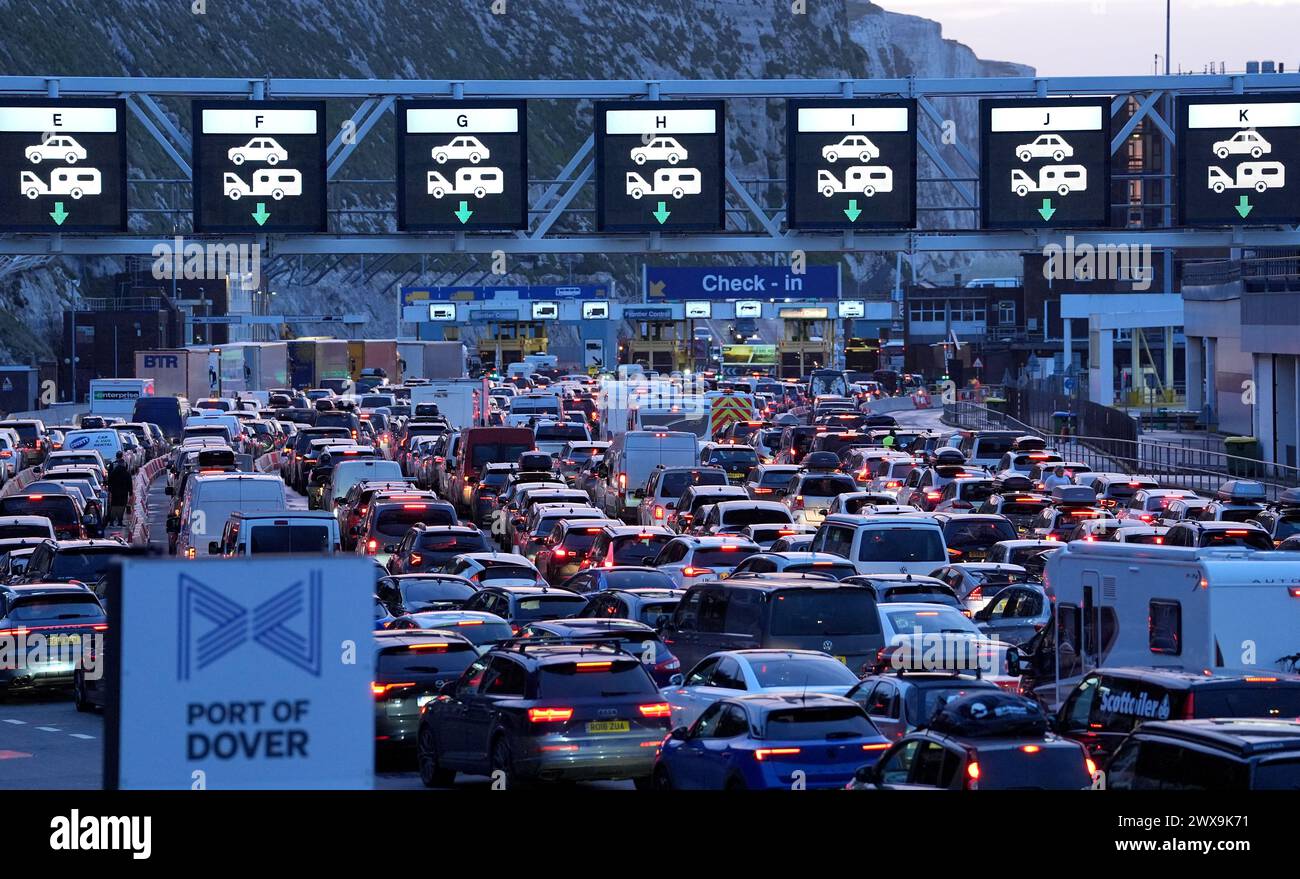 Passengers queue for ferries at the Port of Dover in Kent as the ...