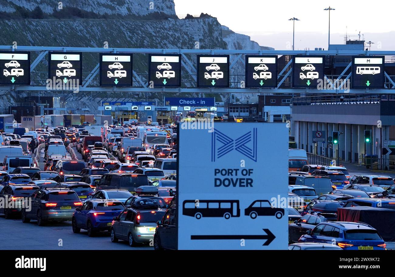 Passengers queue for ferries at the Port of Dover in Kent as the ...