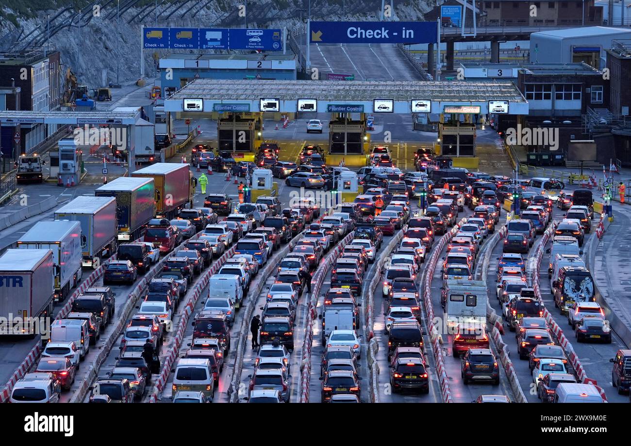 Passengers queue for ferries at the Port of Dover in Kent as the ...
