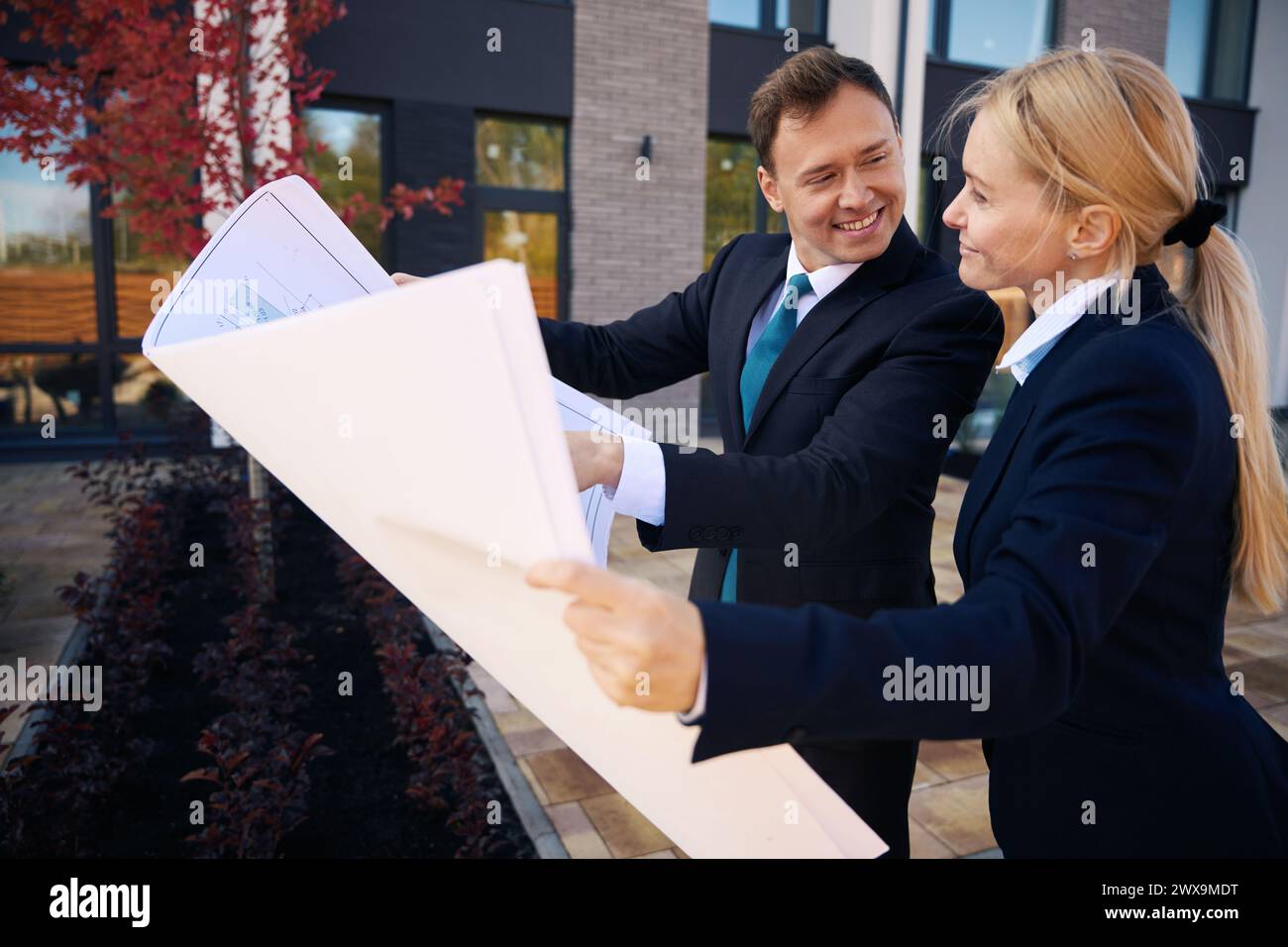 Architect client standing holding hi-res stock photography and images ...