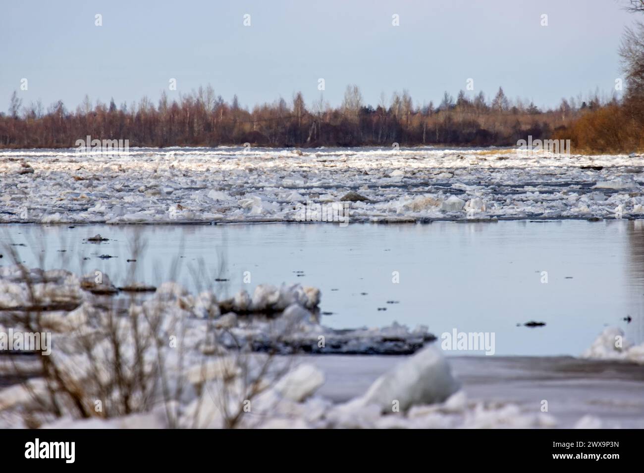 A landscape of an ice drift (ice-boom, debacle) on the northern river ...