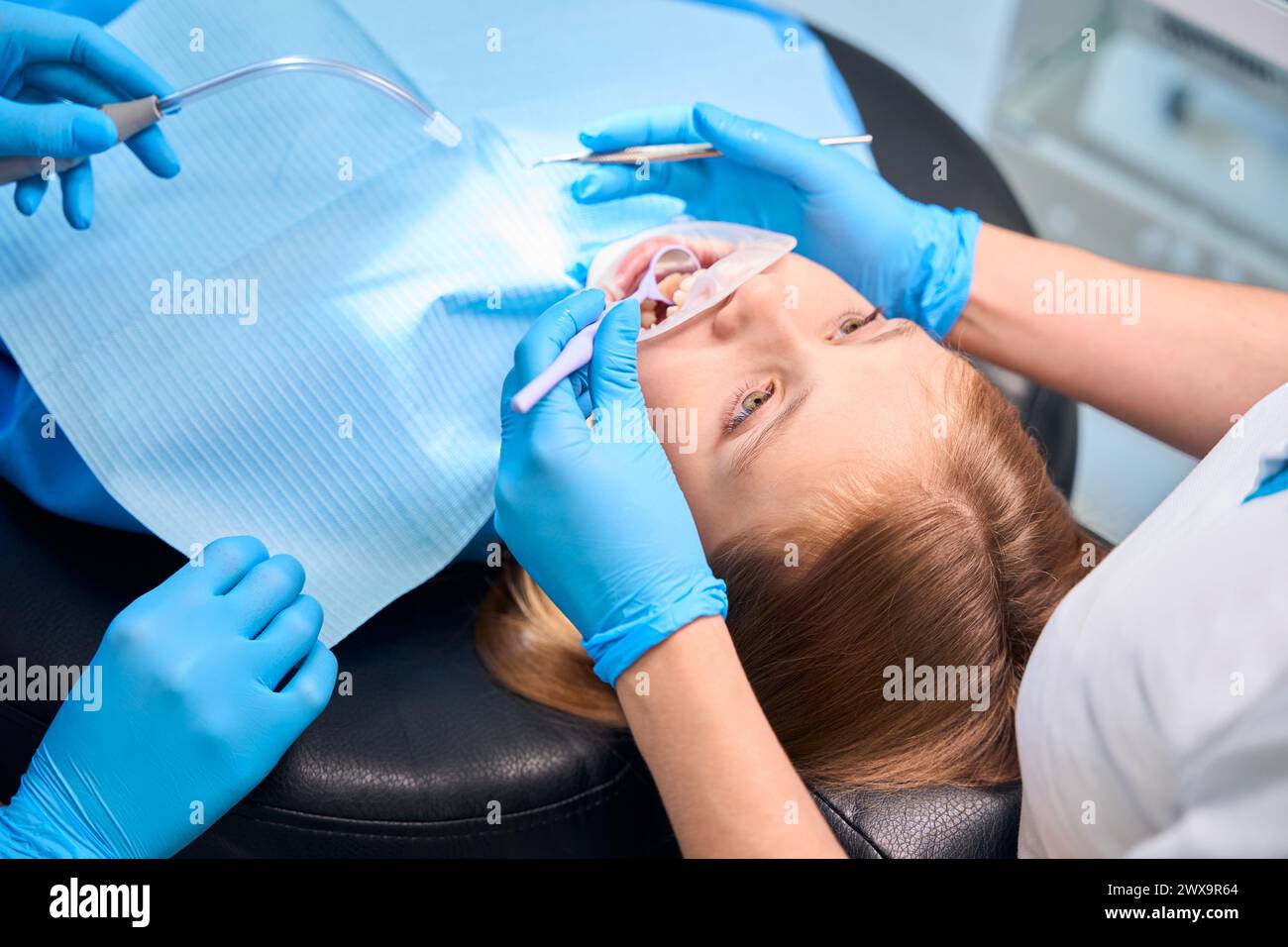 Medical staff at dental clinic uses special tools to clean teeth Stock ...